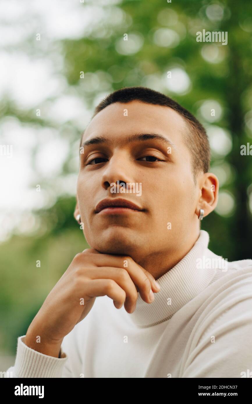 Young man hand outdoors hi-res stock photography and images - Alamy