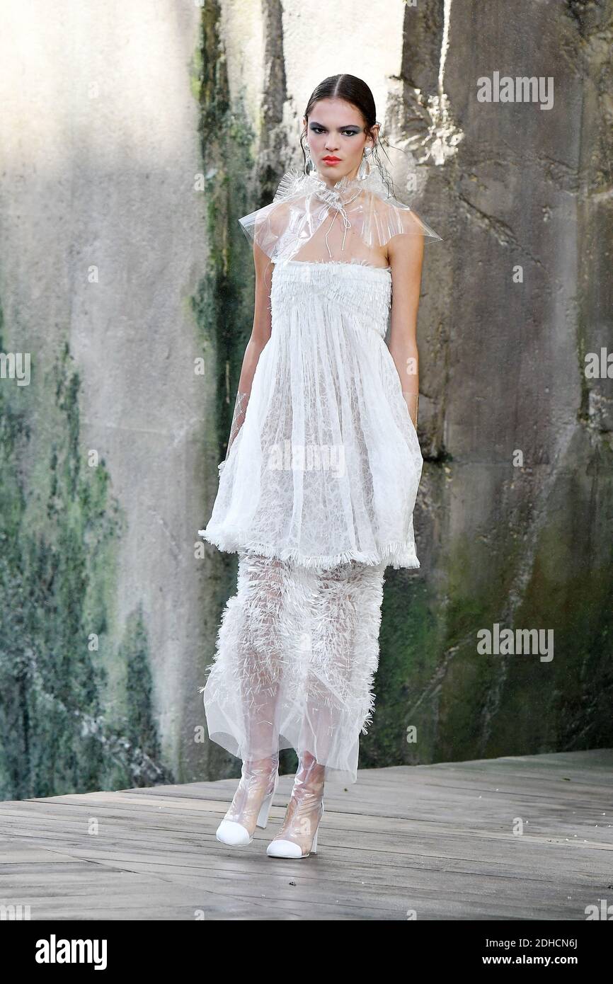 A model displays a creation designed by Karl Lagerfeld during the ...