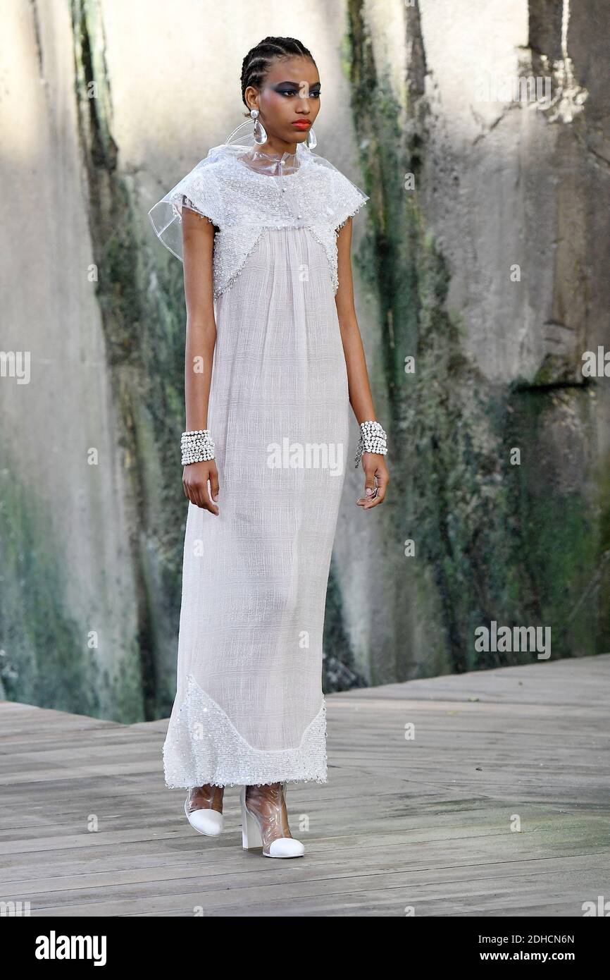 A model displays a creation designed by Karl Lagerfeld during the ...