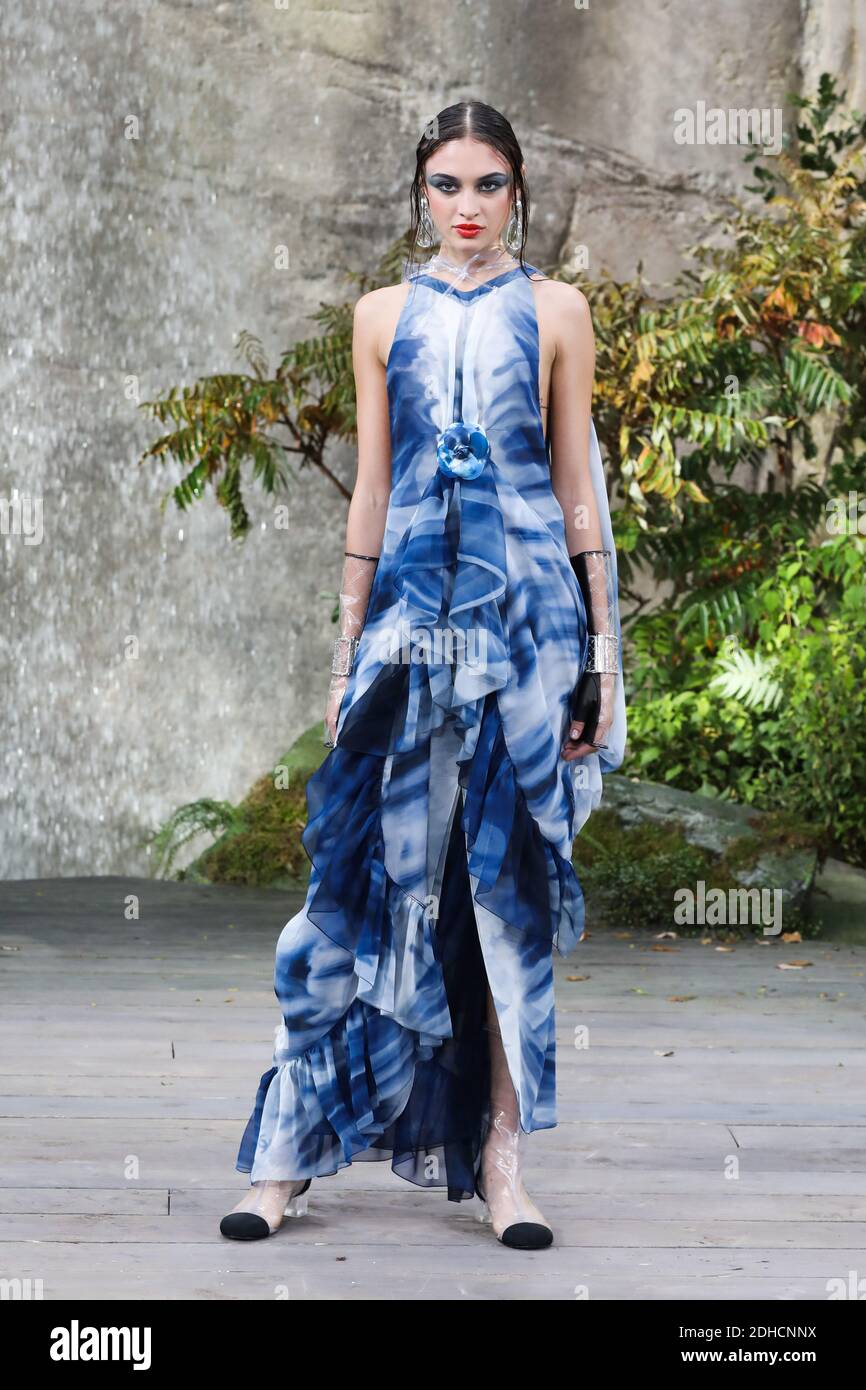 A model walks the runway during the Chanel show as part of the Paris ...