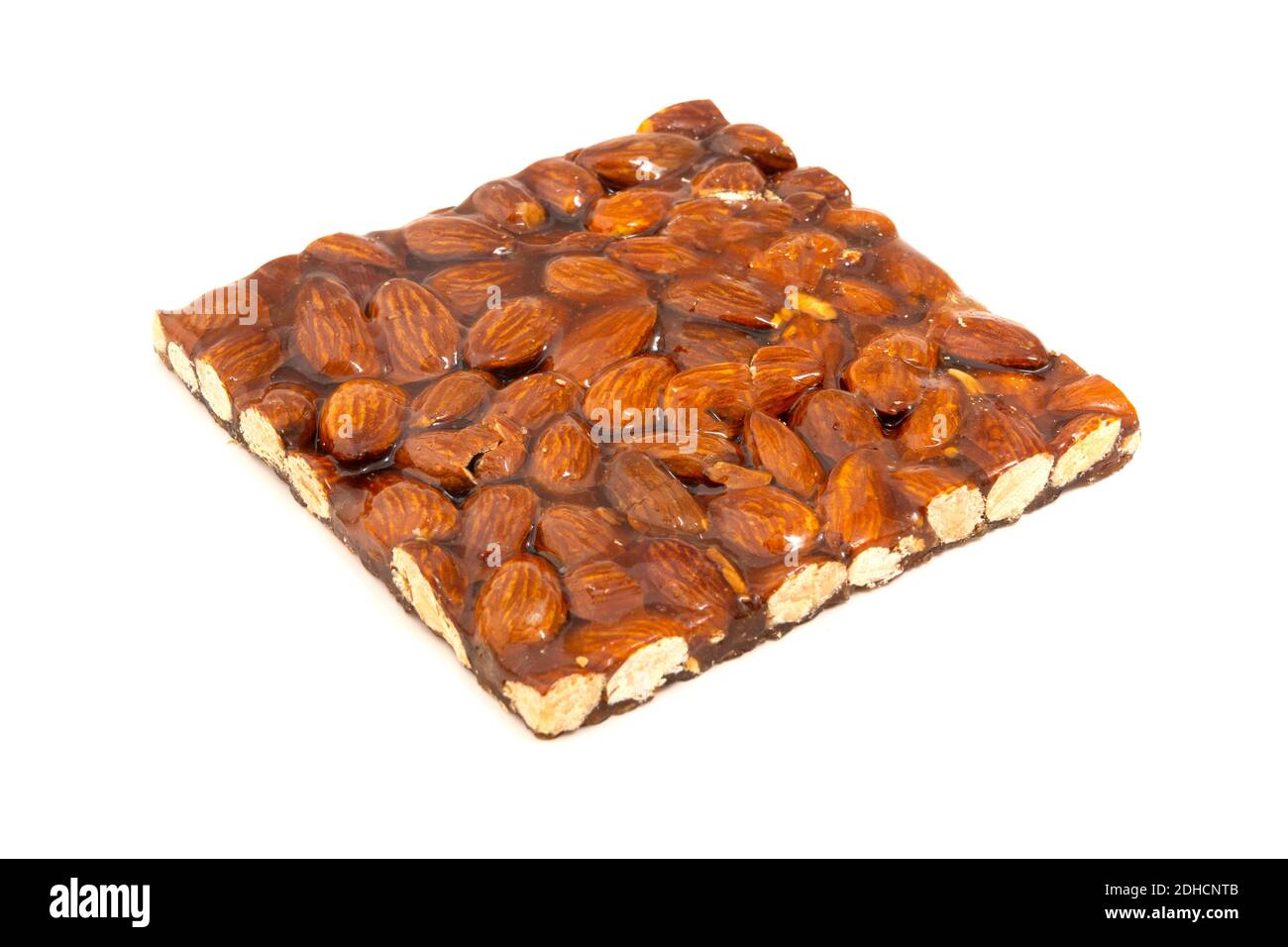 Croccante (traditional italian brittle) with almonds on a white ...