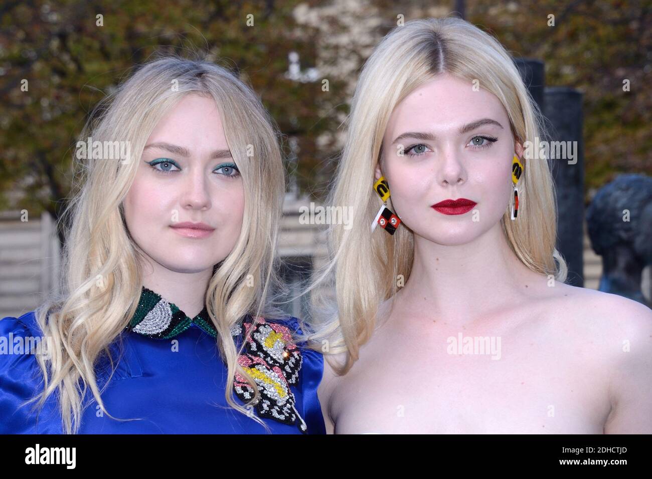 Dakota Fanning and Elle Fanning attending the Miu Miu Fashion Show as ...