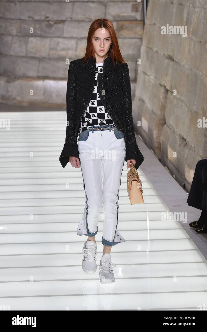 A model displays a creation designed by Nicolas Ghesquiere during the ...