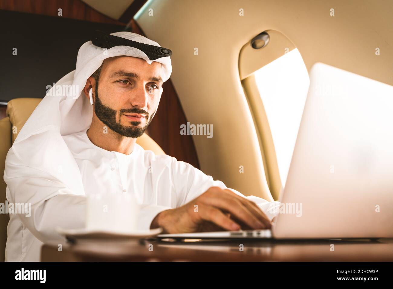 Arabic man wearing kandora in emirates style flying on exclusive ...