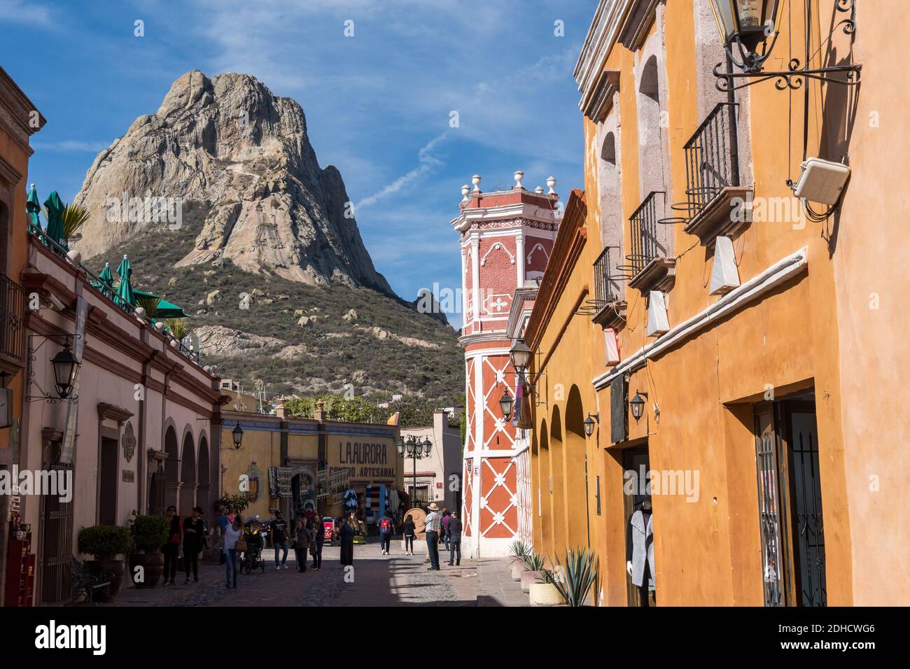 View of the Pena de Bernal monolith down the main street in the ...