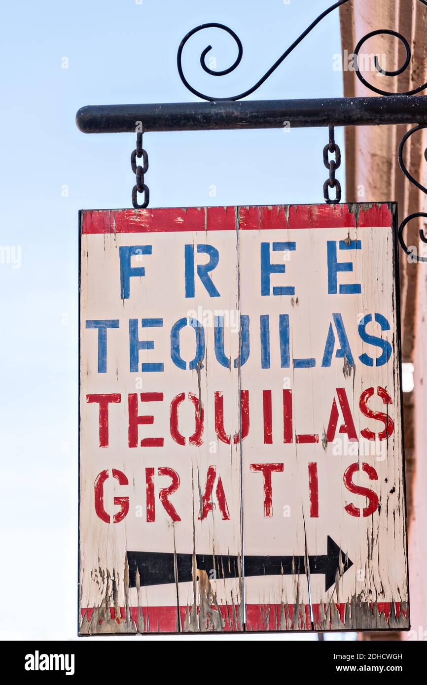 A wooden sign advertising free Tequila in the beautiful colonial ...