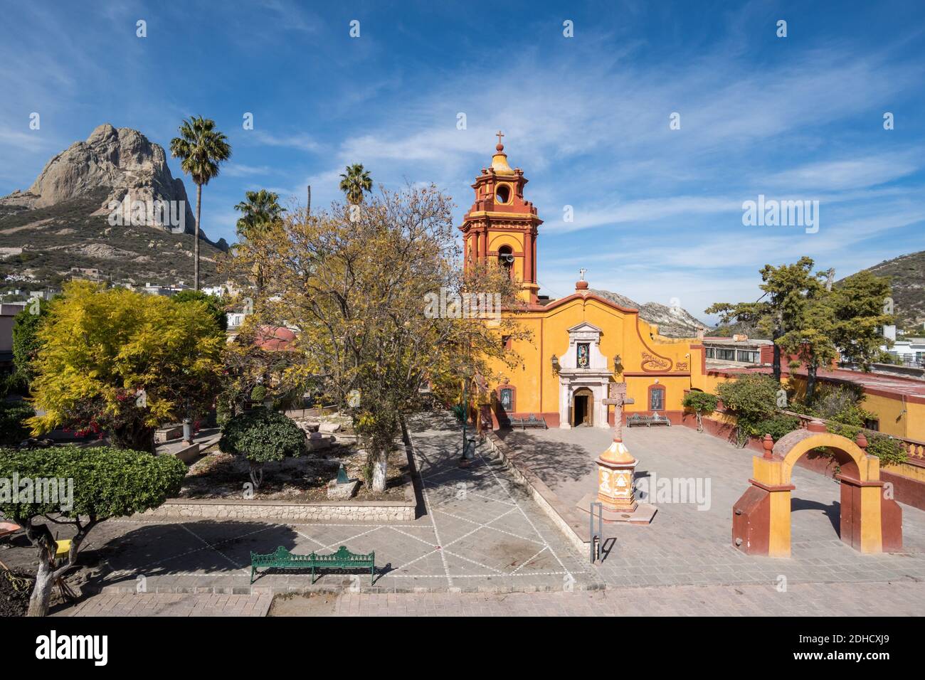 The Parroquia San Sebastian church with the massive monolith rock ...