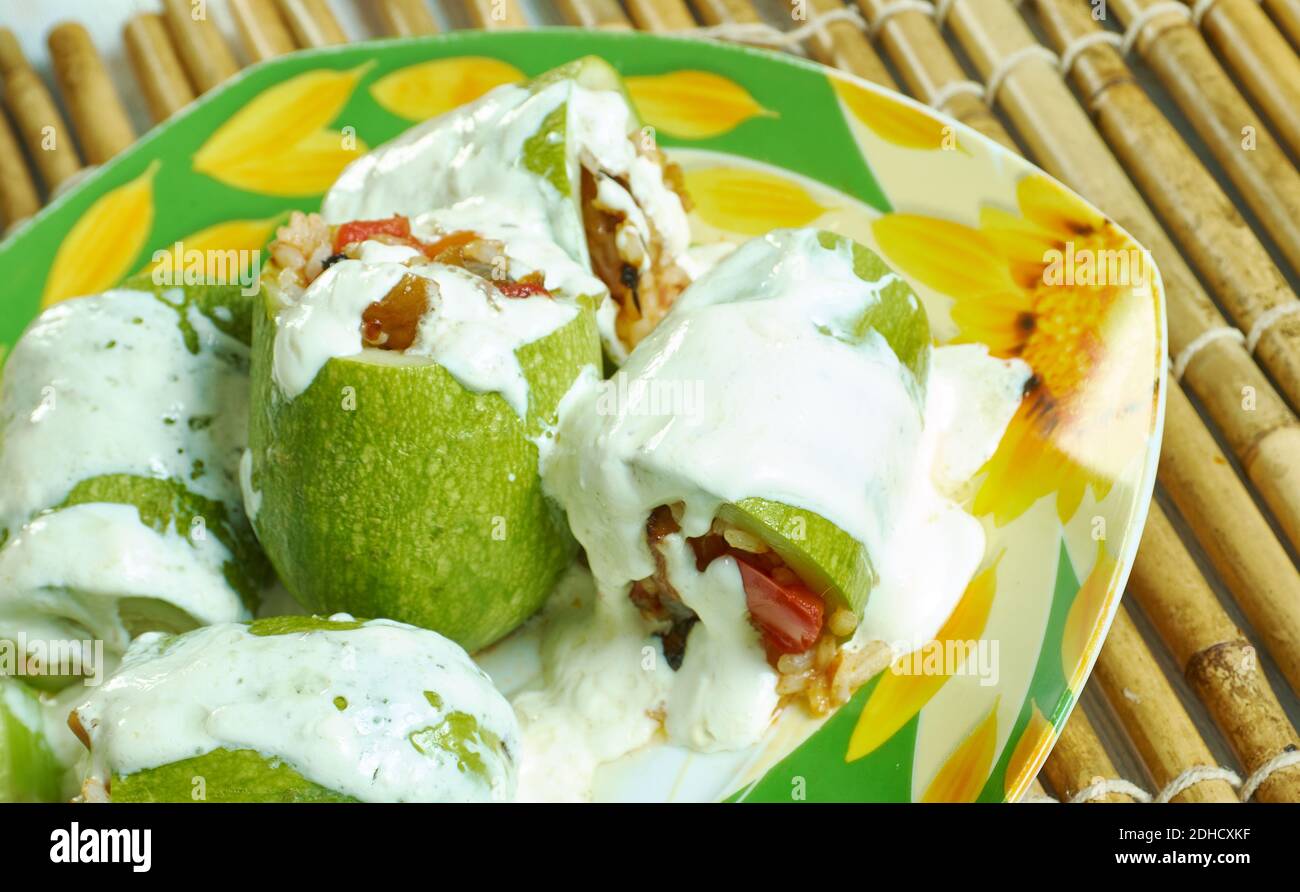 Kolokithakia Gemista with Avgolemono Sauce Stock Photo - Alamy