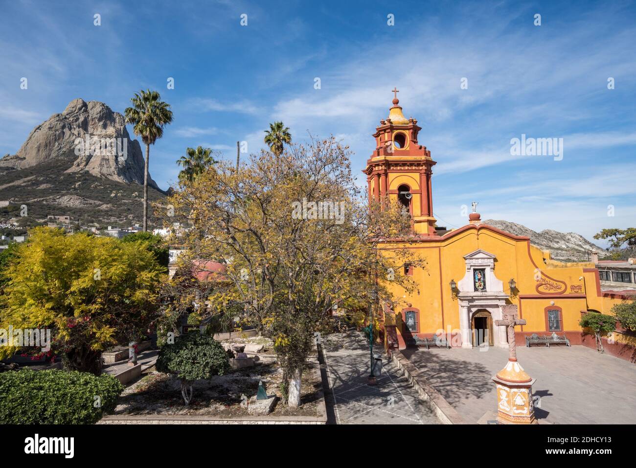 The Parroquia San Sebastian church with the massive monolith rock ...