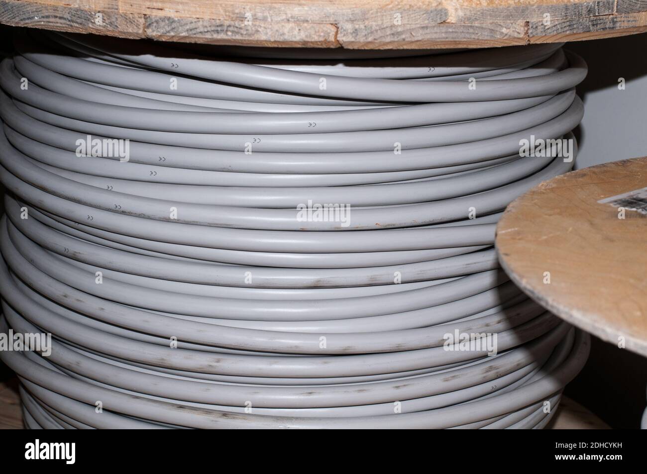 close-up of cables with european standard CE marking on wooden spools ...