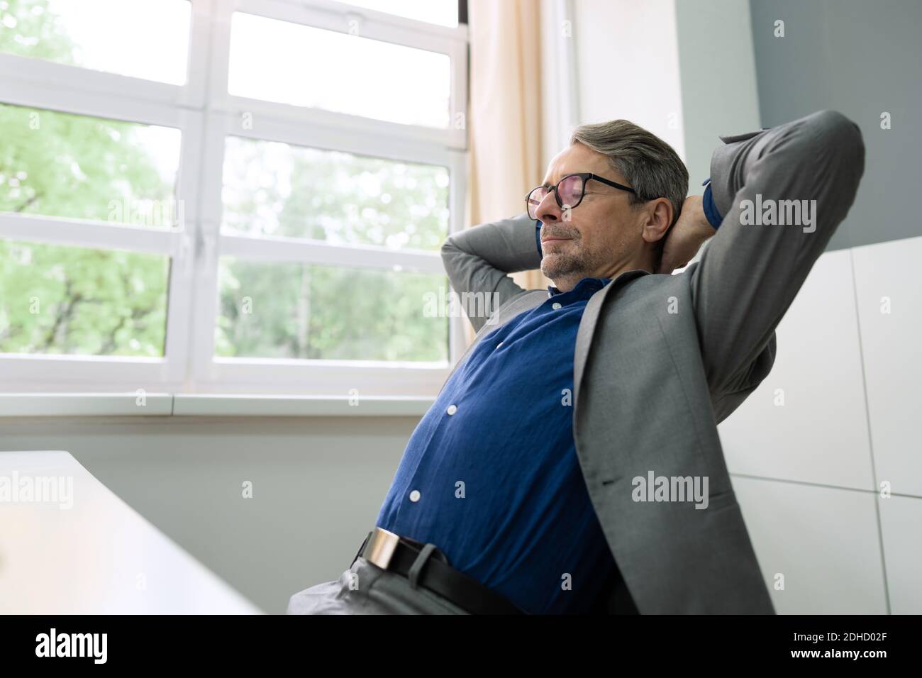 Leaning back chair hi-res stock photography and images - Alamy