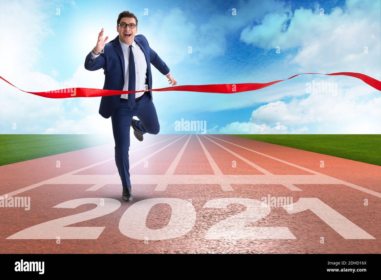 Businessman crossing finish line success achievement hi-res stock ...
