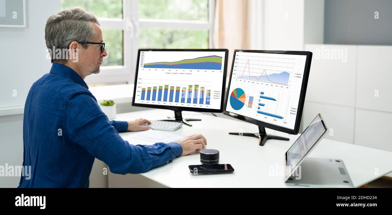Data Analyst With Business Graph On Computer Screen Stock Photo - Alamy
