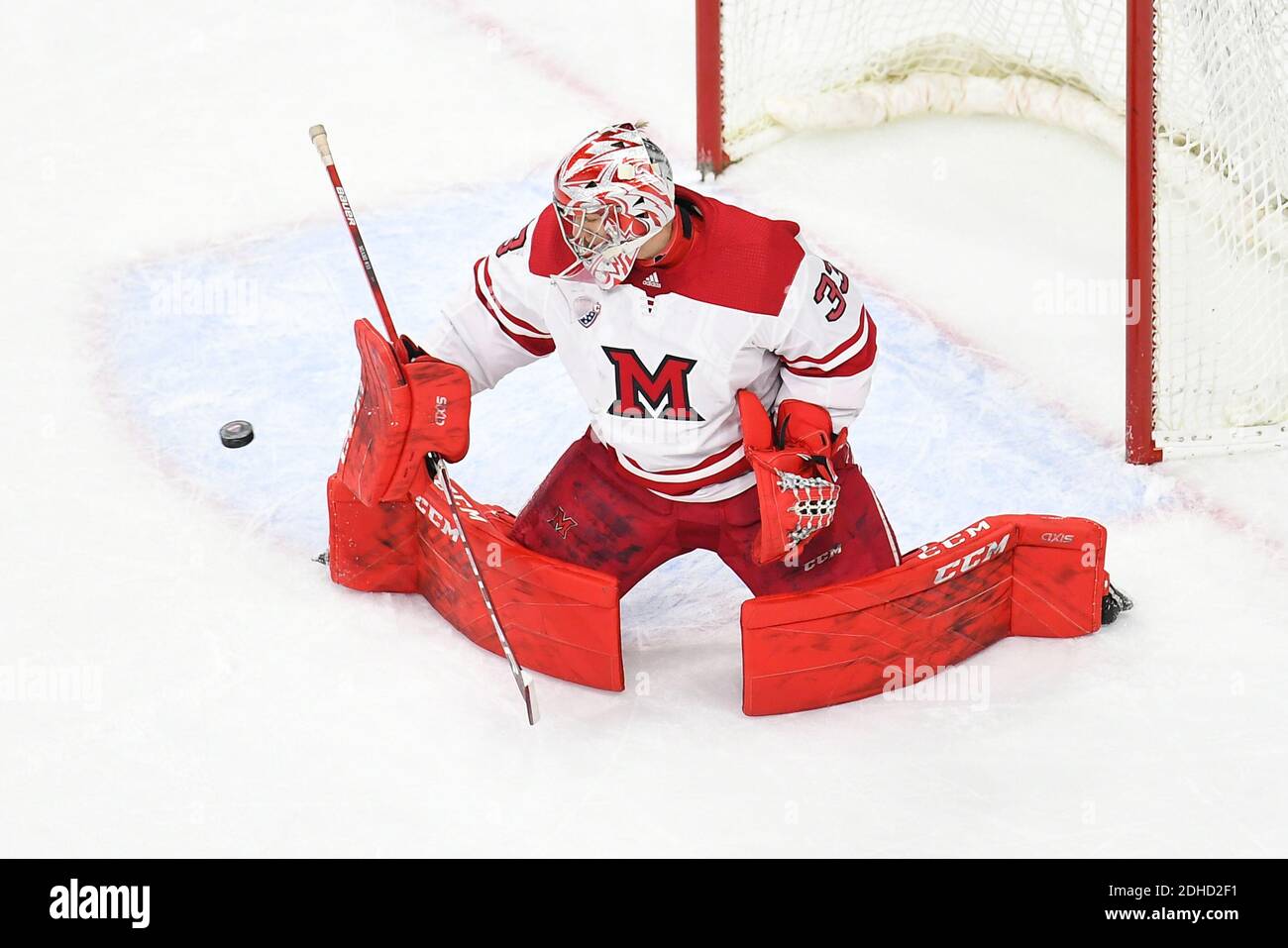 December 10, 2020 A puck is shot just wide of Miami RedHawks goaltender ...