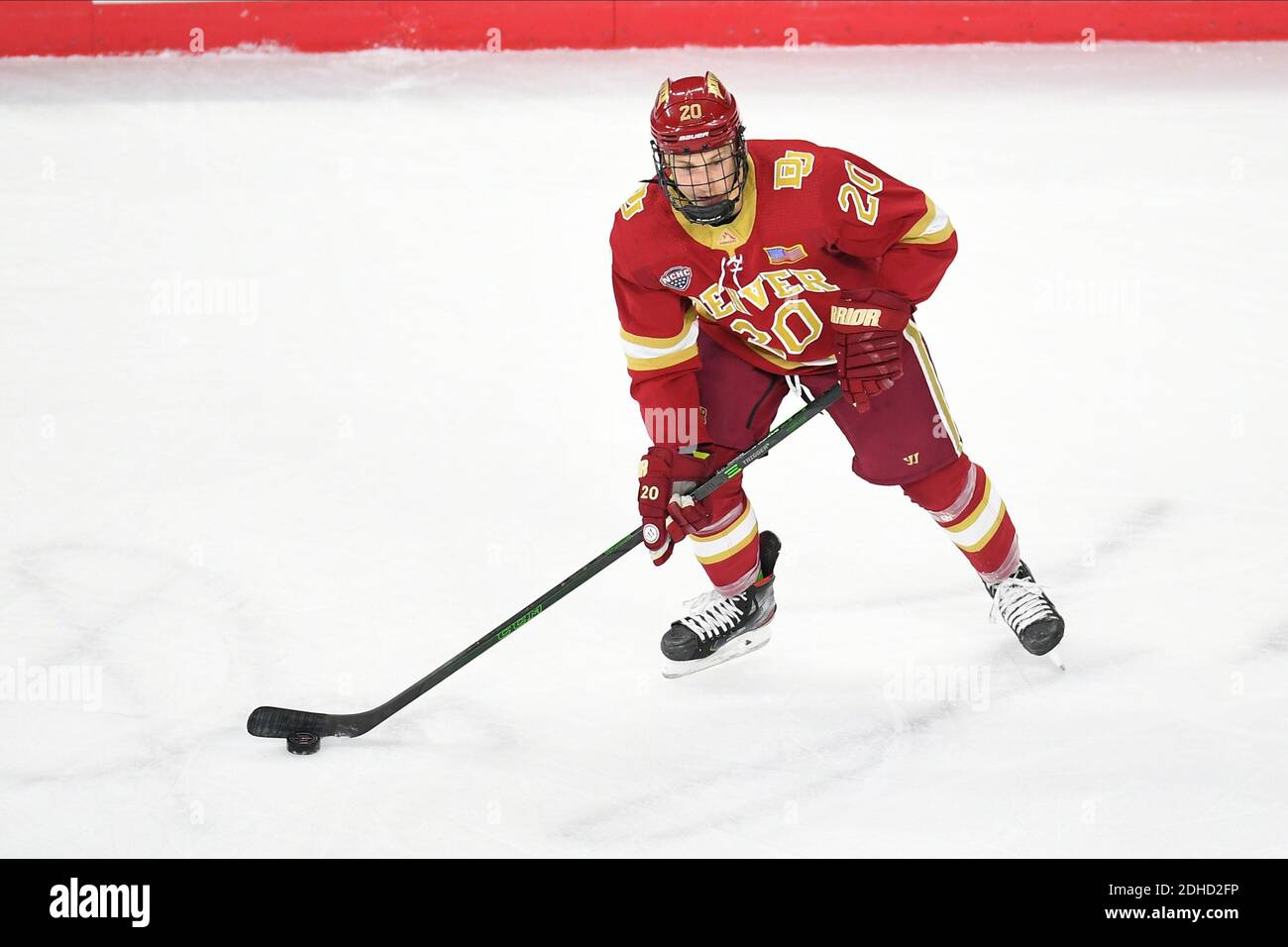 December 10, 2020 Denver Pioneers defenseman Mike Benning (20) looks to ...