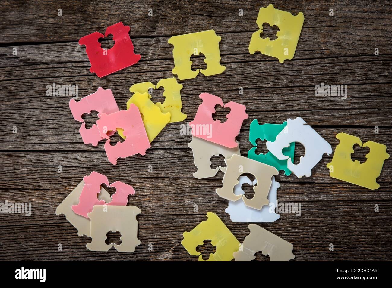 Price Tag Bread Clip on wood background. The muticolor of plastic tags ...