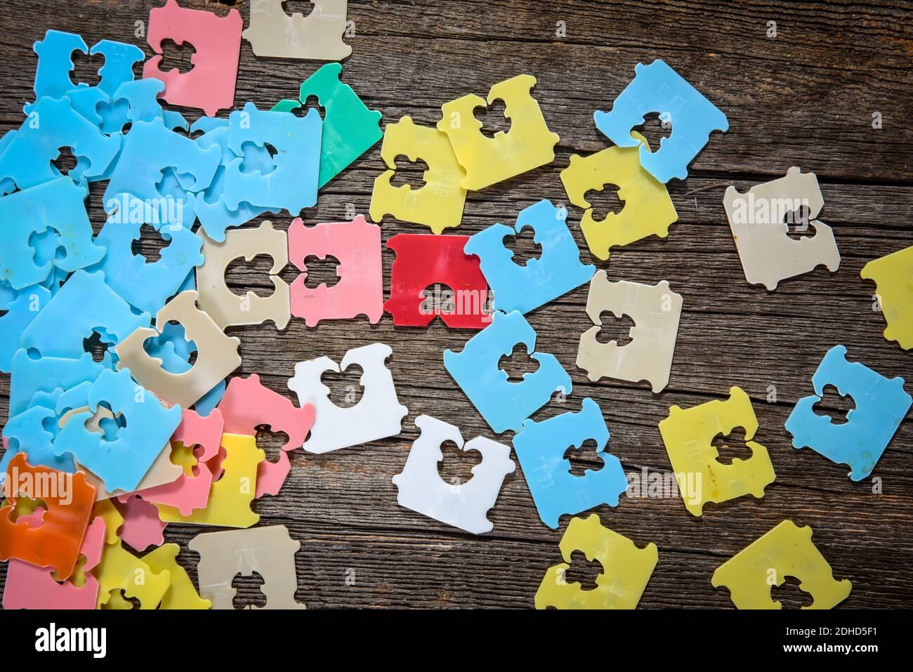 Price Tag Bread Clip on wood background. The muticolor of plastic tags ...