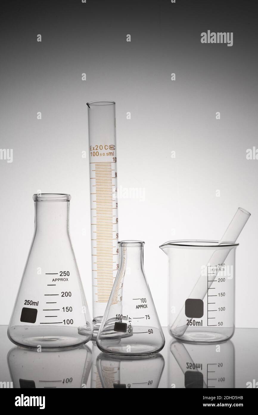 A vertical shot of laboratory flasks, beakers, and tubes Stock Photo ...