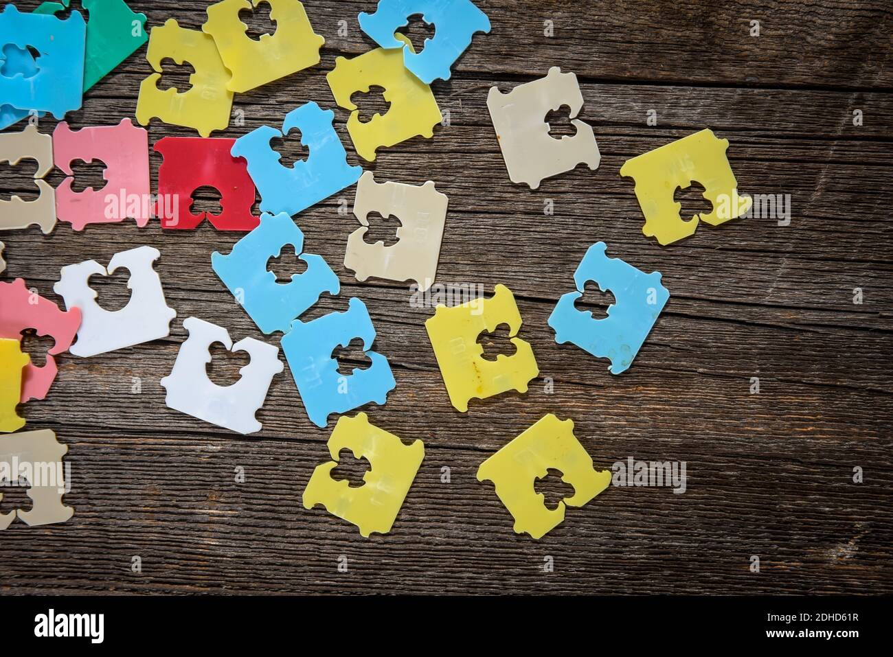 Price Tag Bread Clip on wood background. The muticolor of plastic tags ...