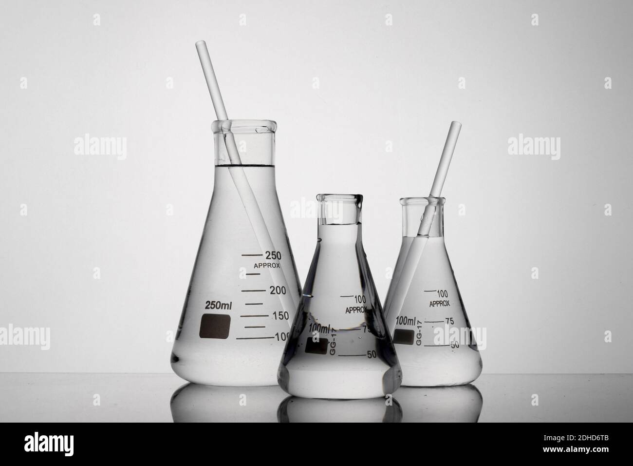 A closeup shot of tubes inside Erlenmeyer beakers Stock Photo - Alamy