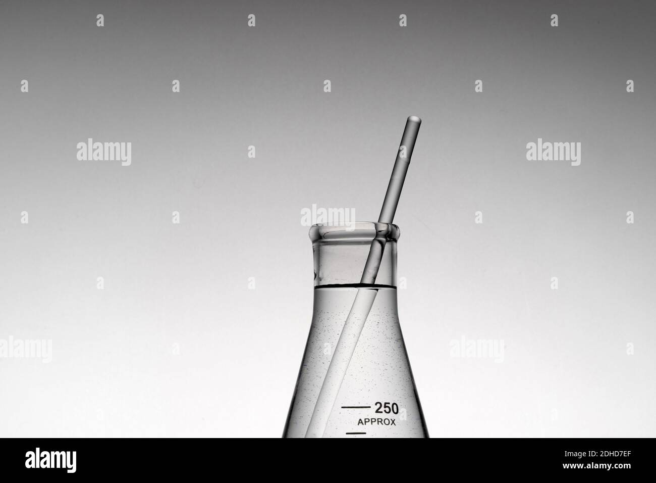 A closeup shot of a tube inside an erlenmeyer beaker Stock Photo - Alamy