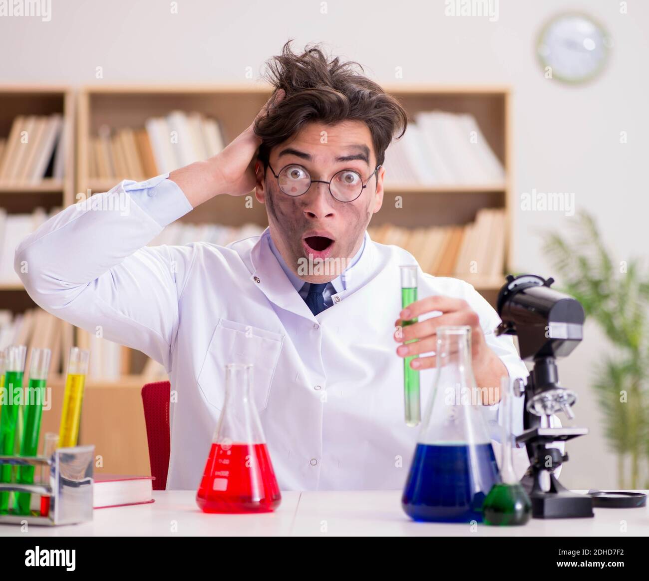 Mad crazy scientist doctor doing experiments in a laboratory Stock ...