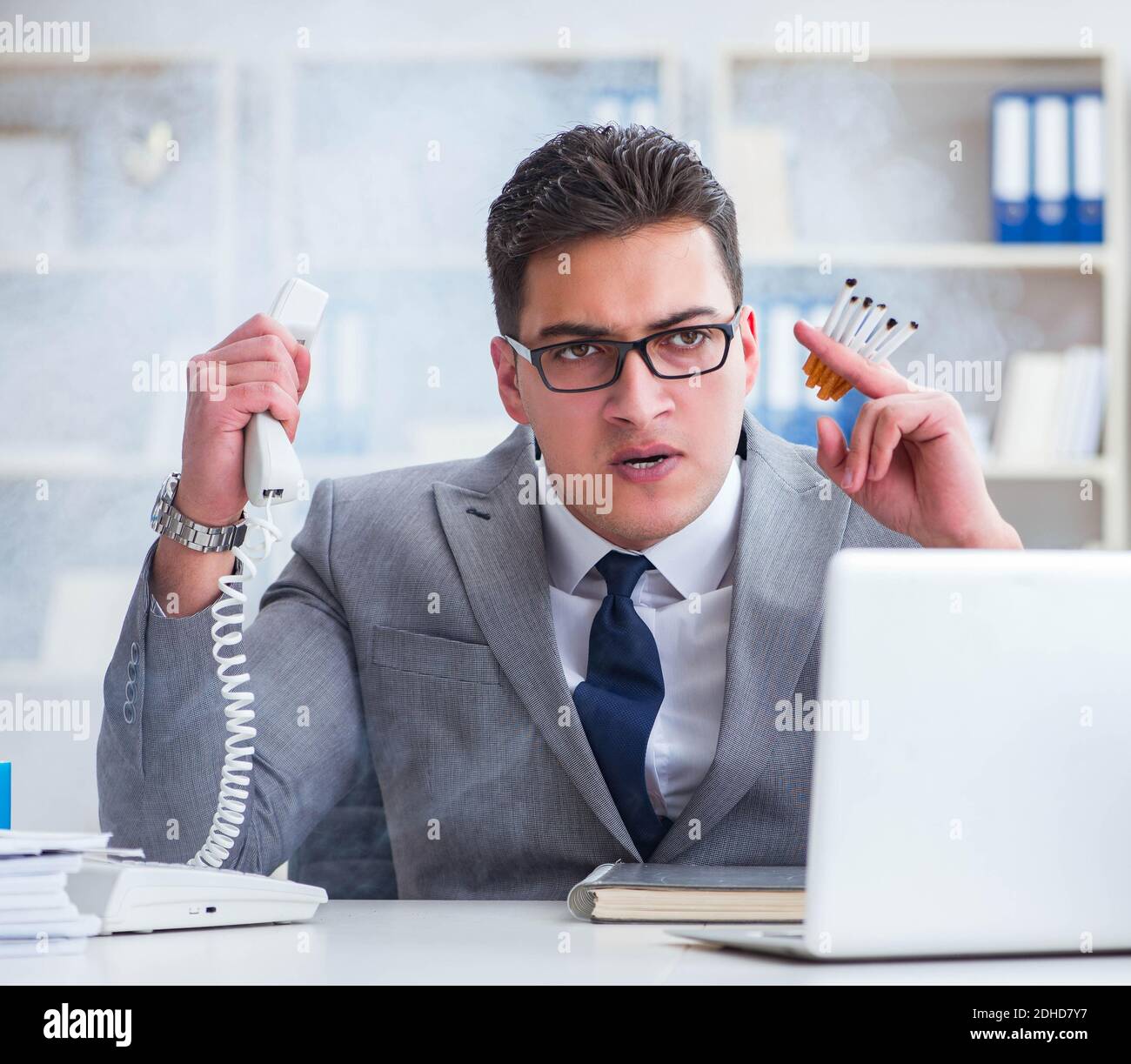 Smoking cigarettes and office hi-res stock photography and images - Alamy