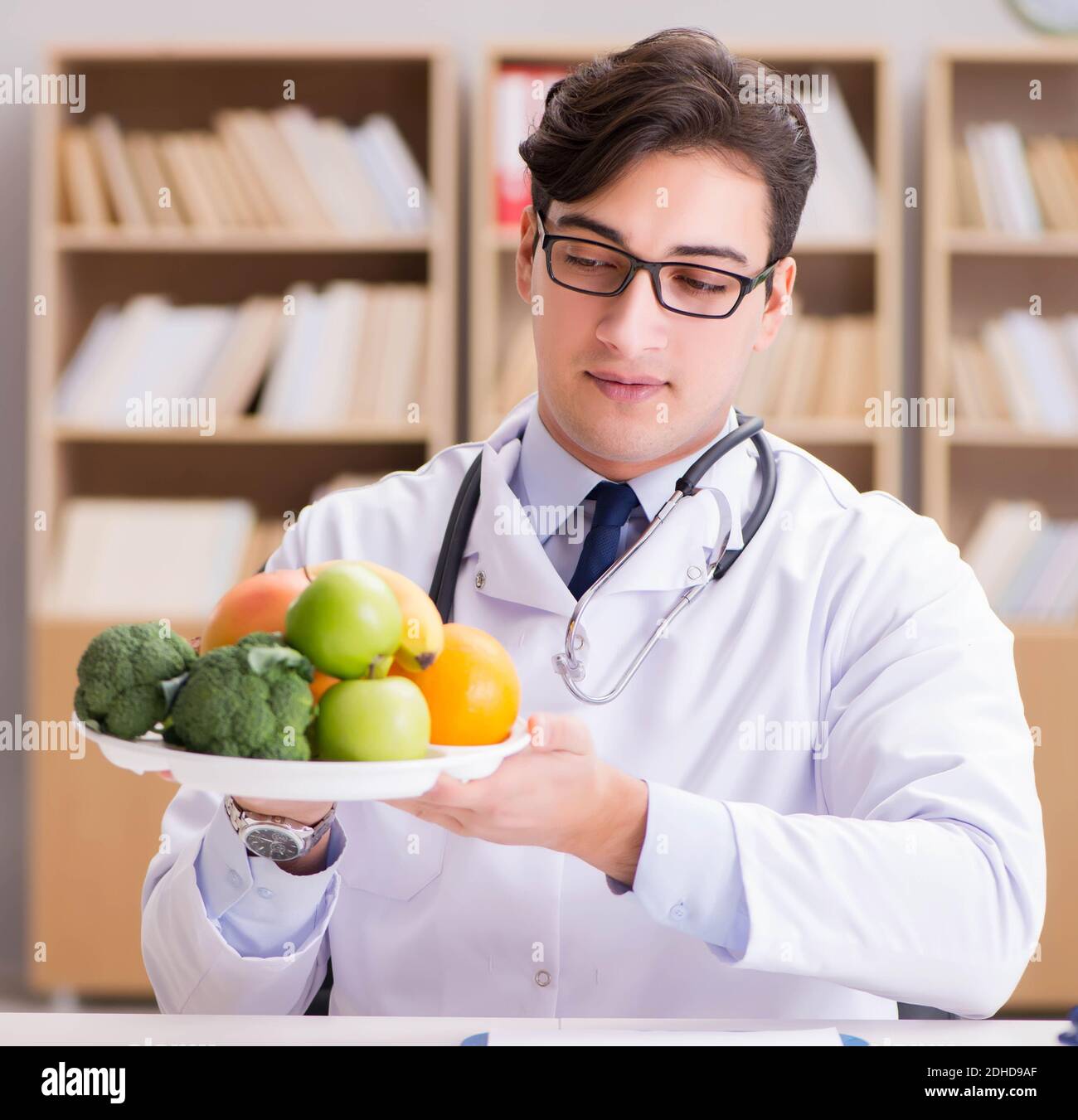 Scientist studying nutrition in various food Stock Photo - Alamy