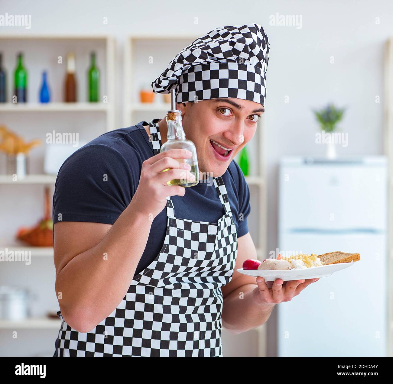 Chef cook cooking a meal breakfast dinner in the kitchen Stock Photo ...