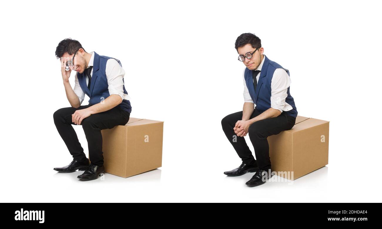 Sitting man sitting on boxes Cut Out Stock Images & Pictures - Alamy
