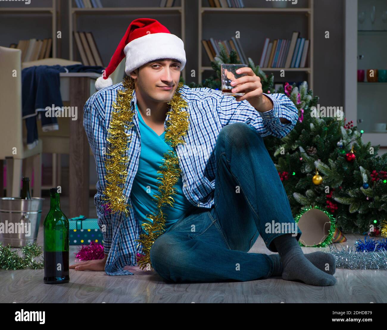 Man celebrating christmas at home alone Stock Photo - Alamy