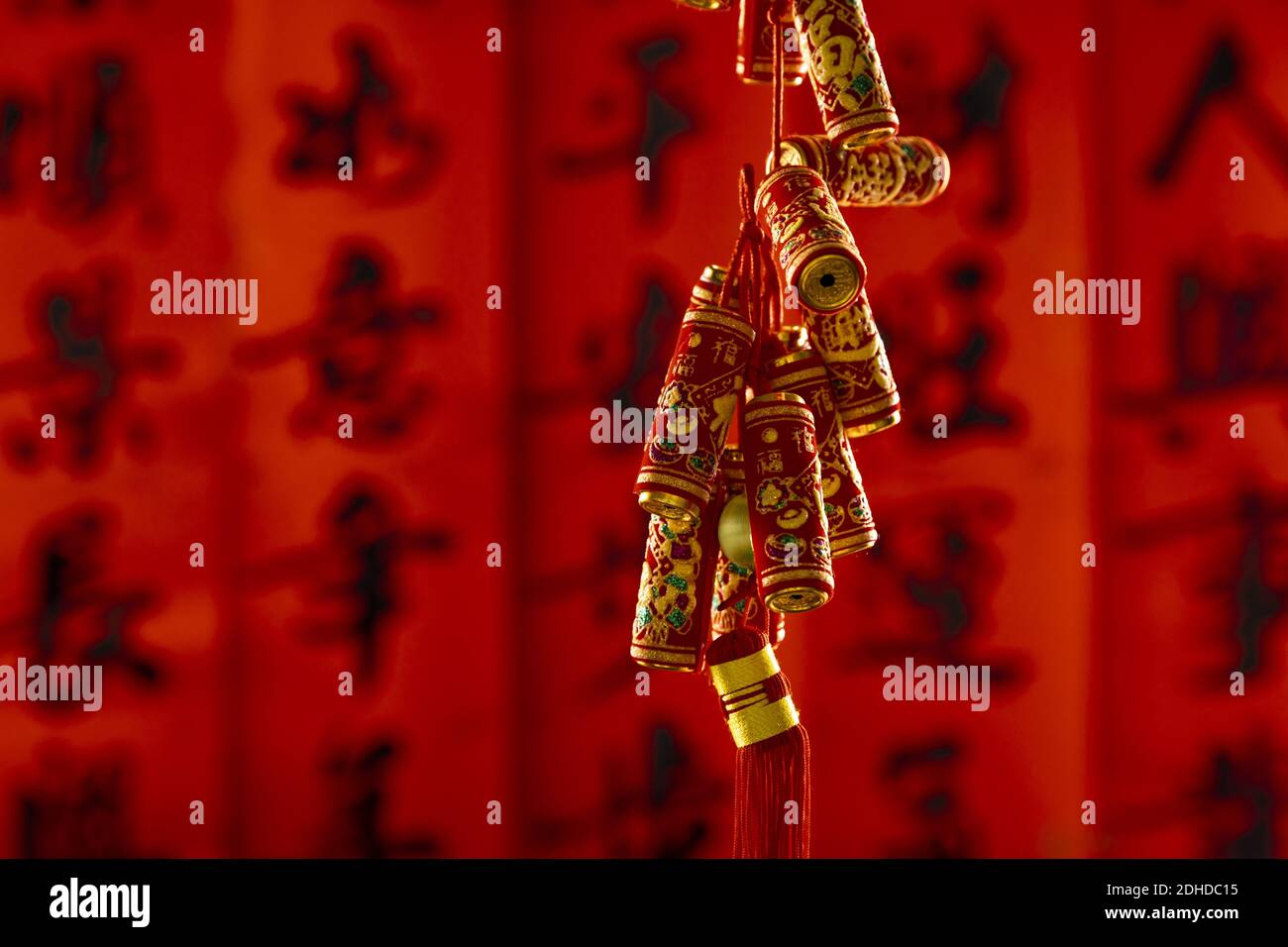 A selective focus shot of a Chinese New Year red decoration with a ...