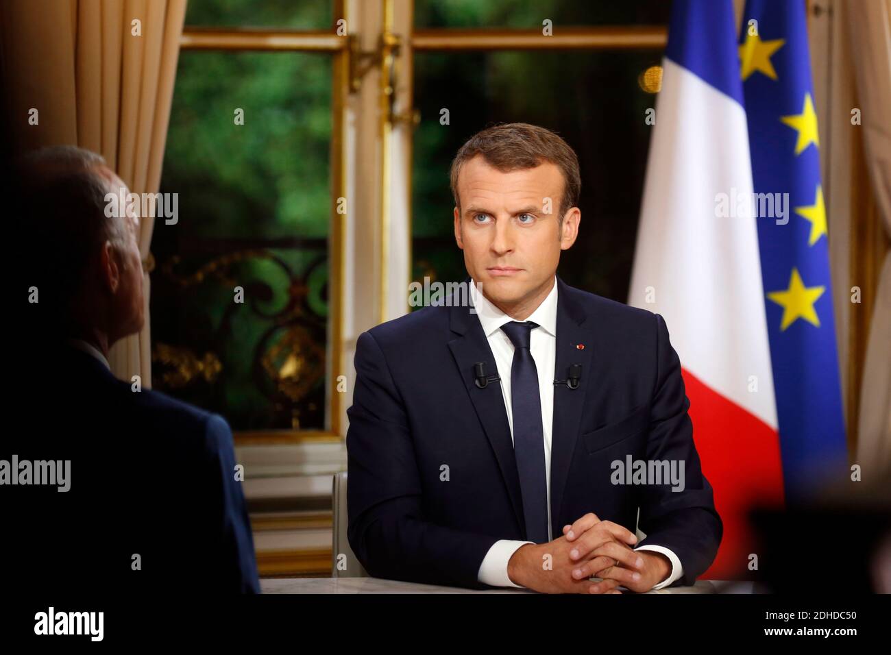French President Emmanuel Macron is seen before his first long live ...
