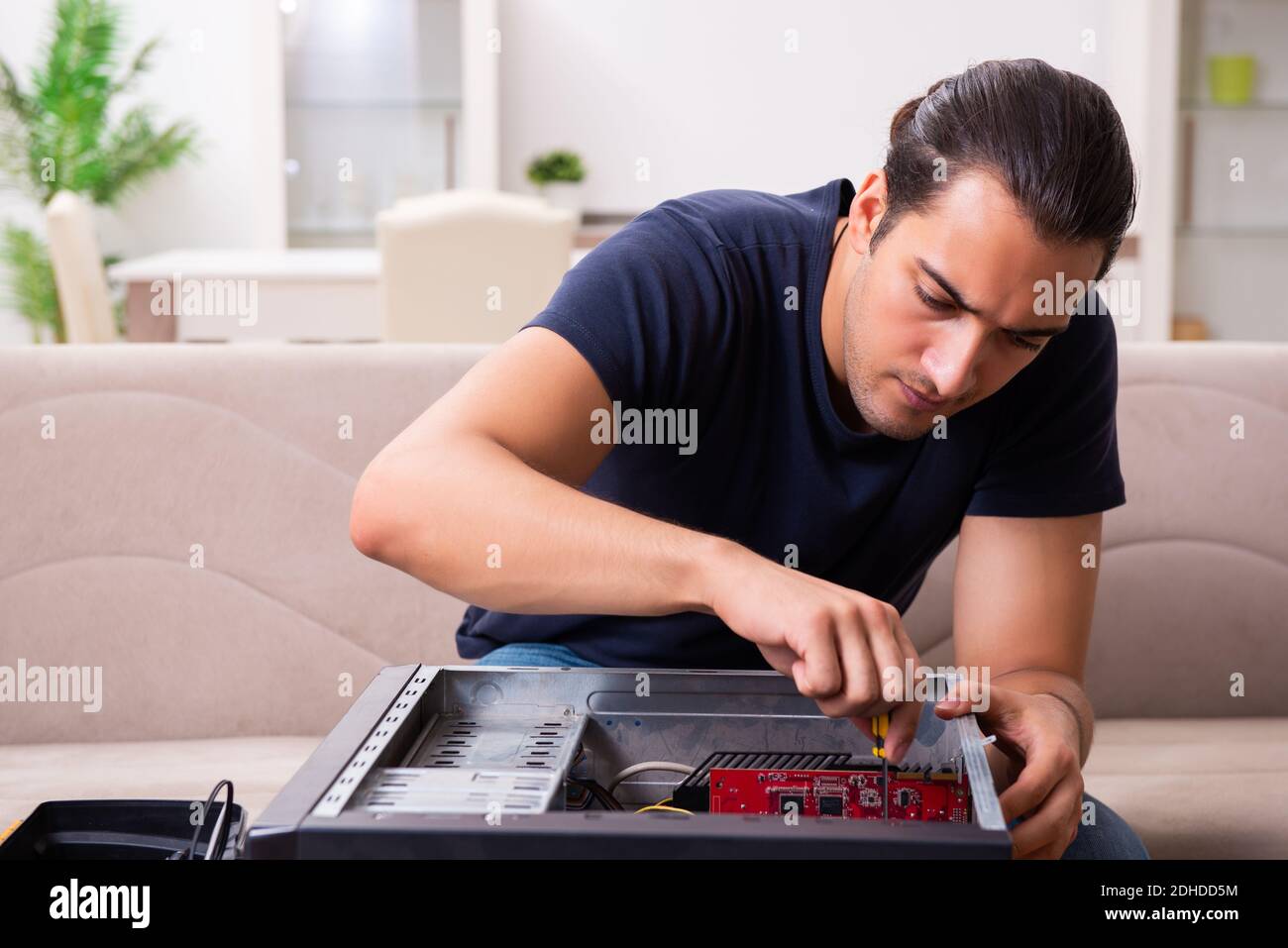 Man fixing damaged memory hi-res stock photography and images - Alamy