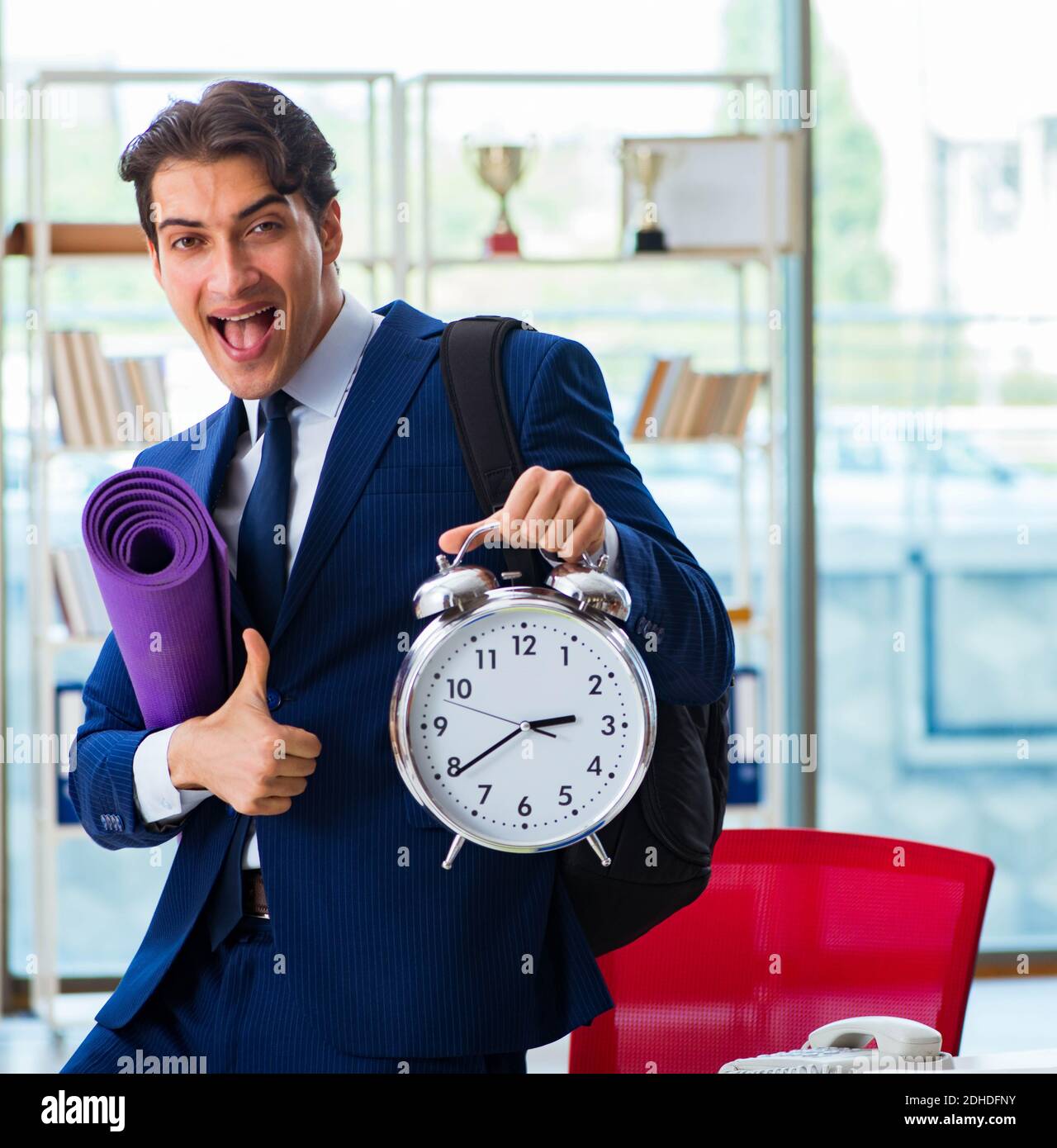 Man getting ready for sports break in the office Stock Photo - Alamy