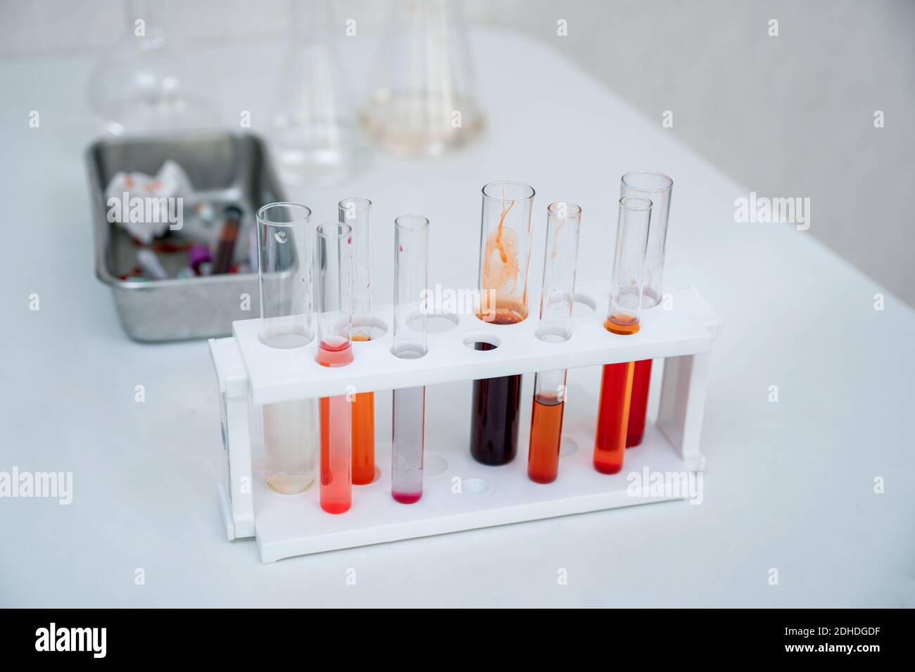 Various colors chemical test tubes in rack at laboratory Stock Photo ...