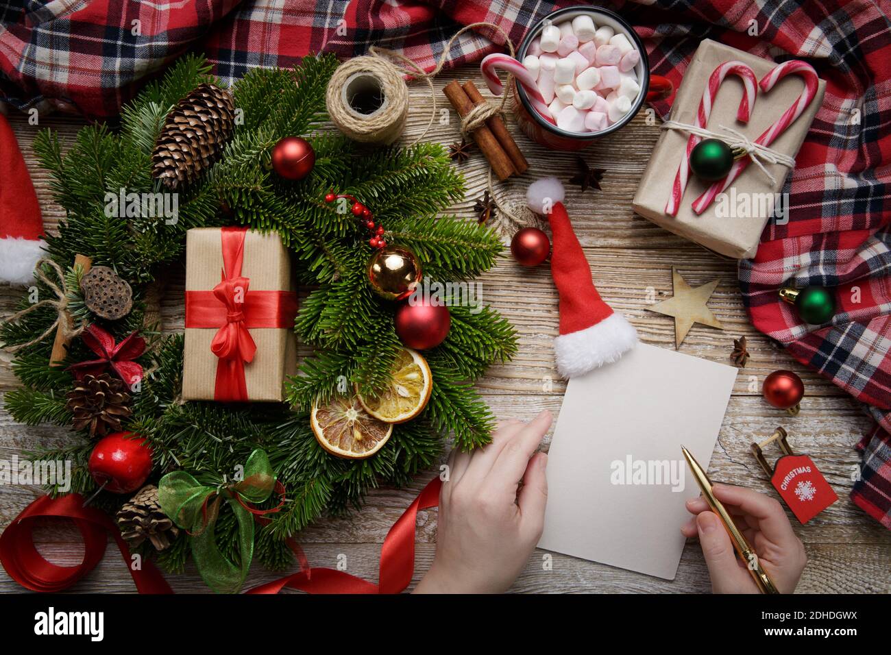 hand writing letter to Santa or greeting card. Christmas and holiday ...