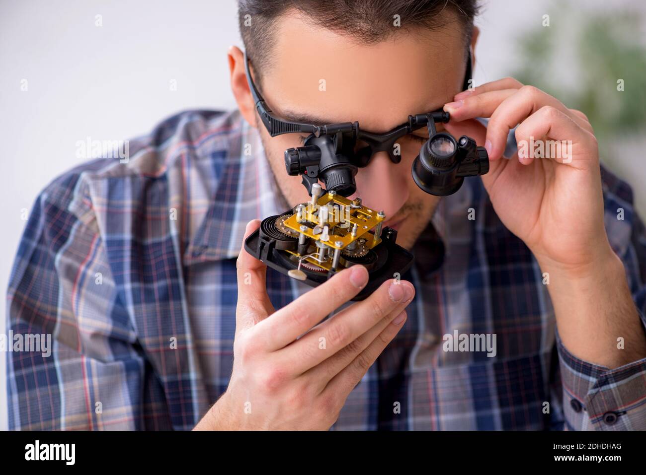 Handyman looking watch hi-res stock photography and images - Alamy