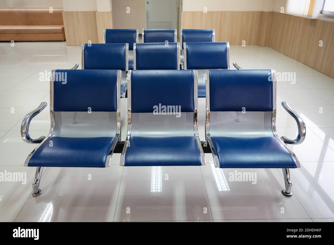Row of aluminium blue bench chair in reception at hospital Stock Photo ...