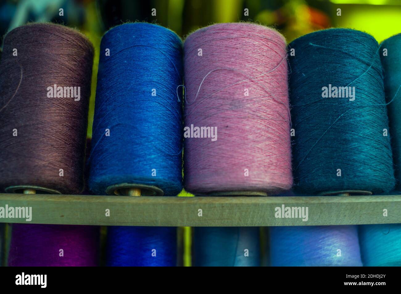 spools of thread in professional set up Stock Photo - Alamy