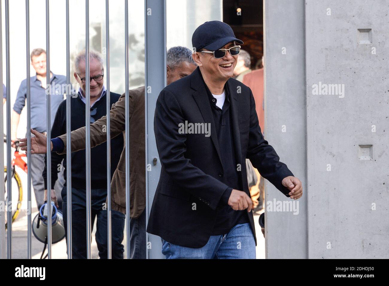 Wong Kar Wai attending the re-enactment of the first movie ever made ...