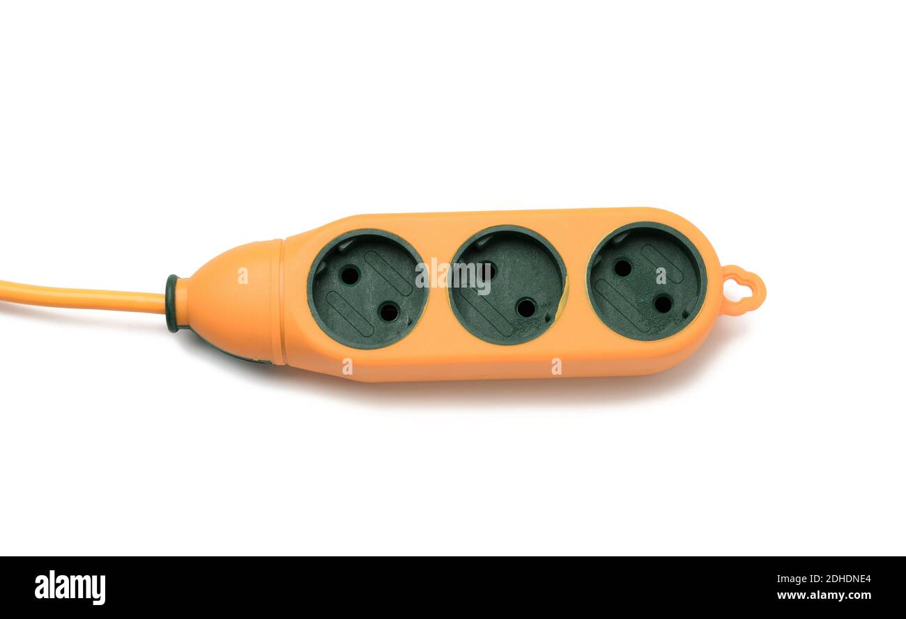Rubber orange power strip with three sockets isolated on white ...
