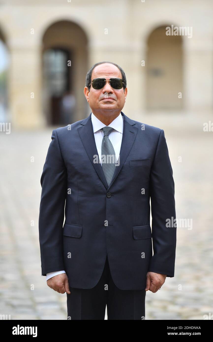 Egypt's President Abdel Fattah al-Sisi walks past the honour guard at ...