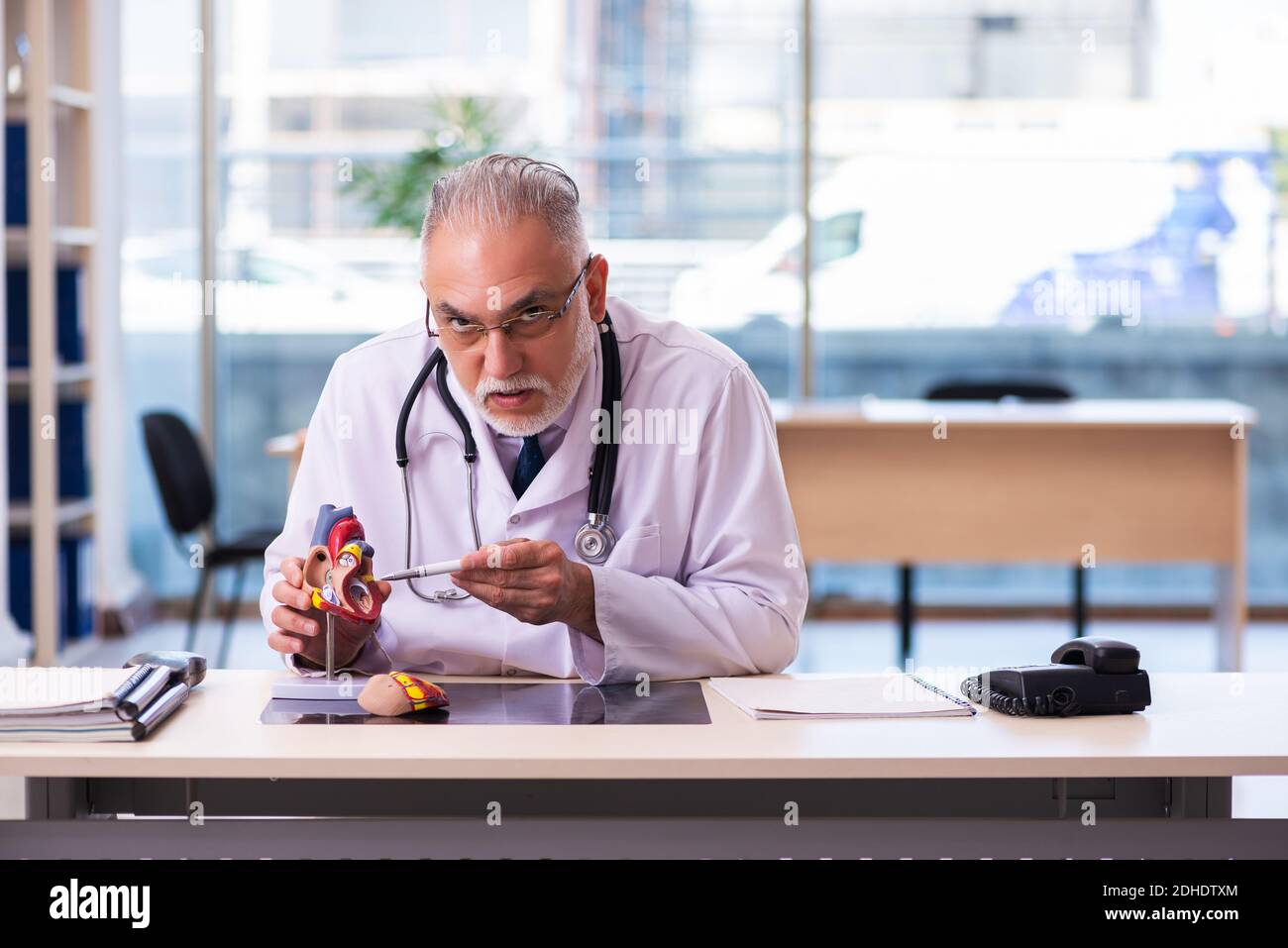 Doctor showing cardiogram old hi-res stock photography and images - Alamy