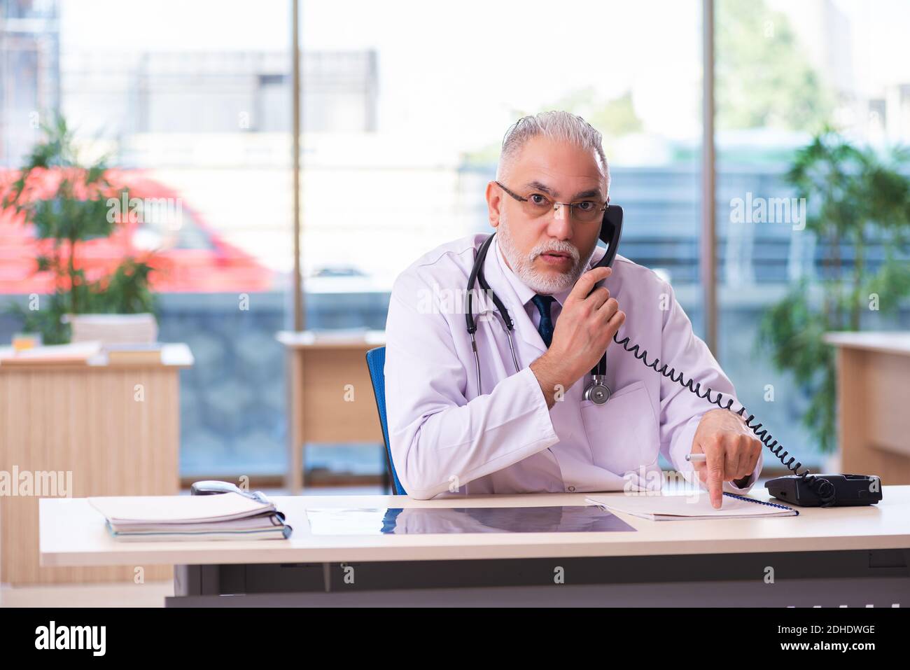 Doctor taking notes telehealth hi-res stock photography and images - Alamy