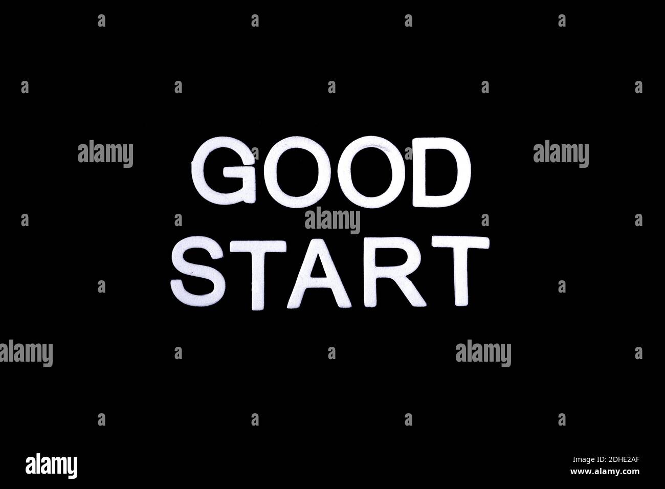 An inscription "Good start" written with white letters cut out of foam ...