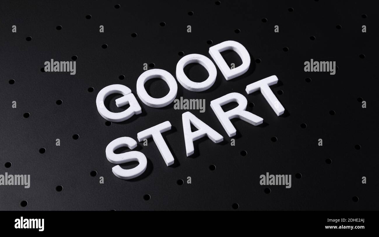 A top view of a text "Good start" - business concept Stock Photo - Alamy