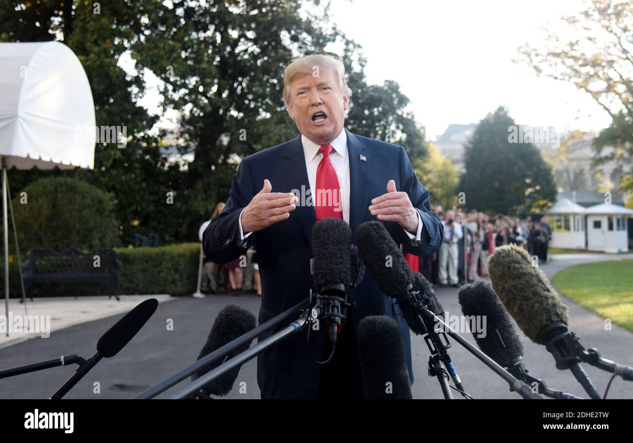 U.S. President Donald Trump answers questions from the media before ...