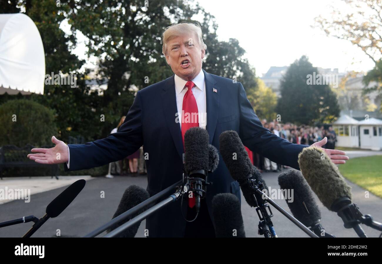 U.S. President Donald Trump answers questions from the media before ...