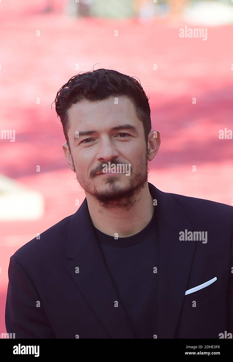 English actor Orlando Bloom walks a red carpet for the film 'Romans ...